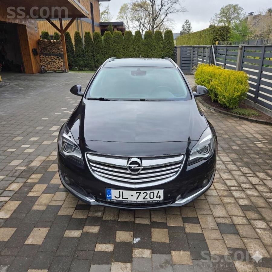 Black Opel Insignia 2013 in Riga, with an engine capacity of 2.00 L and mileage of 174 thousand km for 7300 €, photo 1 on AUTOMOTO.COM.LV