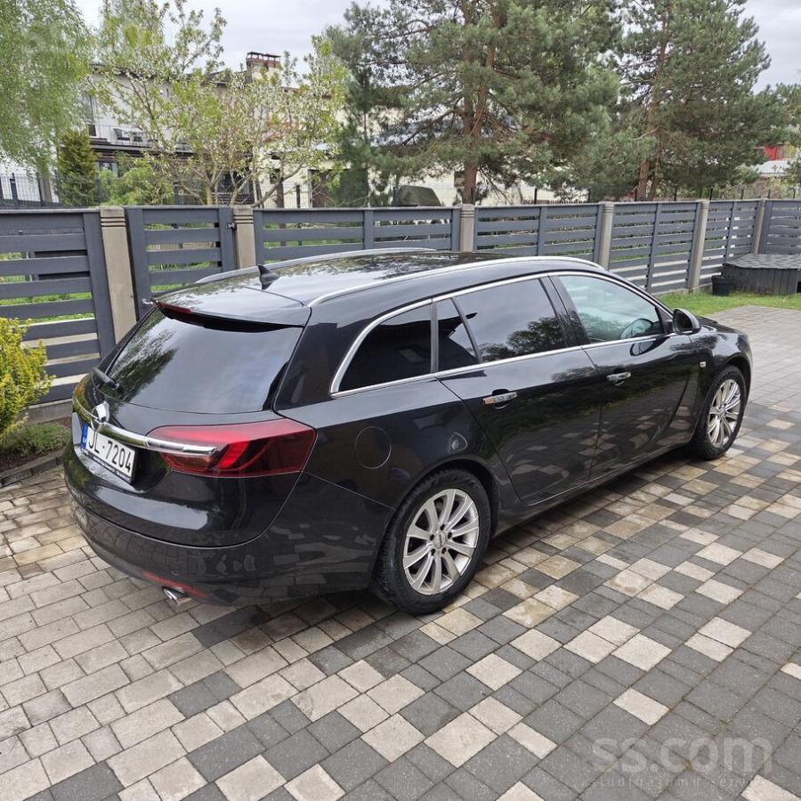Black Opel Insignia 2013 in Riga, with an engine capacity of 2.00 L and mileage of 174 thousand km for 7300 €, photo 4 on AUTOMOTO.COM.LV