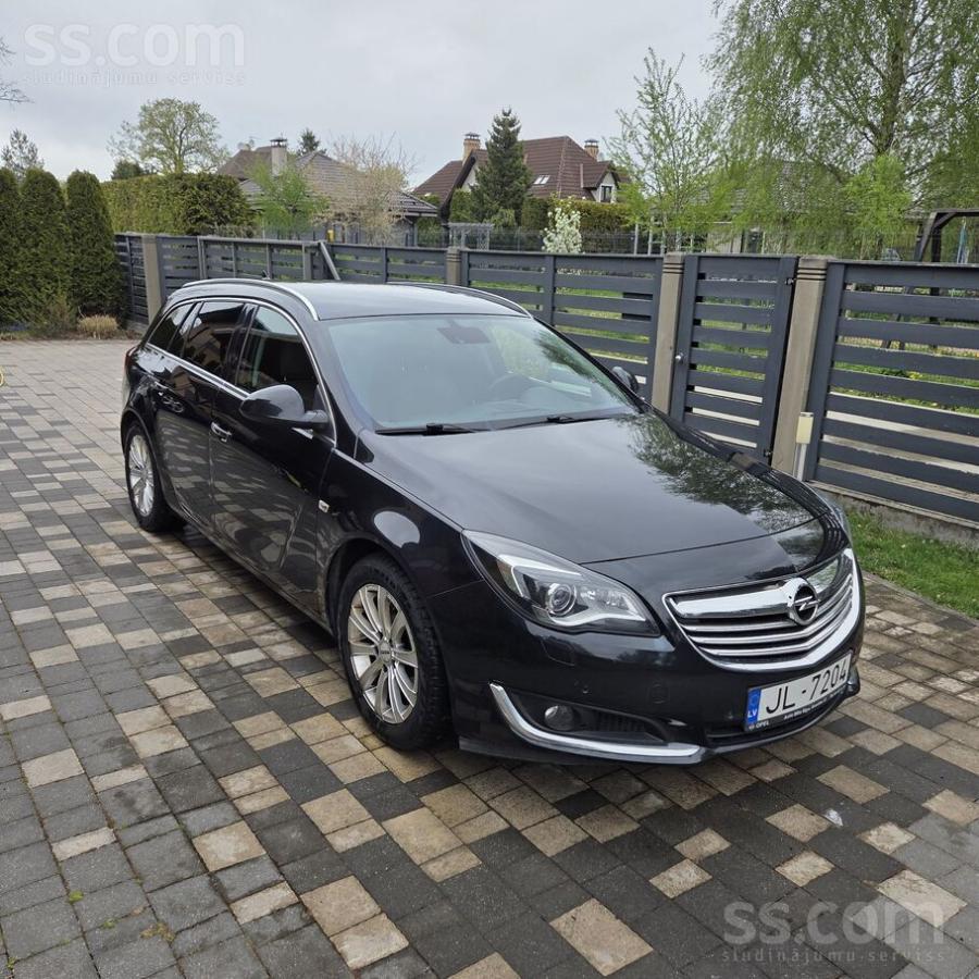 Black Opel Insignia 2013 in Riga, with an engine capacity of 2.00 L and mileage of 174 thousand km for 7300 €, photo 5 on AUTOMOTO.COM.LV