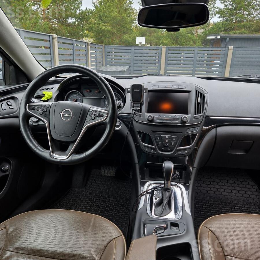 Black Opel Insignia 2013 in Riga, with an engine capacity of 2.00 L and mileage of 174 thousand km for 7300 €, photo 9 on AUTOMOTO.COM.LV