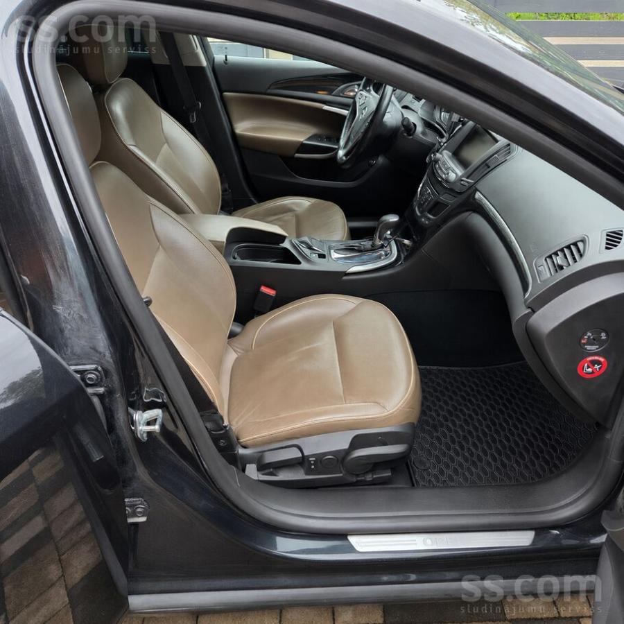 Black Opel Insignia 2013 in Riga, with an engine capacity of 2.00 L and mileage of 174 thousand km for 7300 €, photo 10 on AUTOMOTO.COM.LV