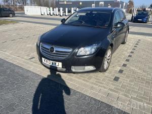 Black Opel Insignia 2013 in Liepaja, with an engine capacity of 2.00 L and mileage of 250 thousand km for 1500 €, photo 5 on AUTOMOTO.COM.LV