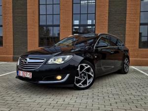 Black Opel Insignia 2013 in Riga, with an engine capacity of 2.00 L and mileage of 203 thousand km for 6390 €, photo  on AUTOMOTO.COM.LV