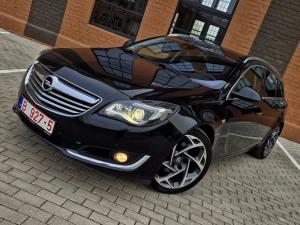 Black Opel Insignia 2013 in Riga, with an engine capacity of 2.00 L and mileage of 203 thousand km for 6390 €, photo 13 on AUTOMOTO.COM.LV