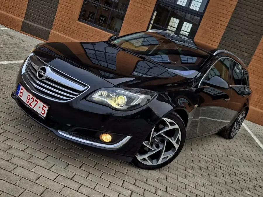 Black Opel Insignia 2013 in Riga, with an engine capacity of 2.00 L and mileage of 203 thousand km for 6390 €, photo 13 on AUTOMOTO.COM.LV