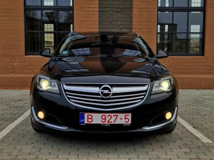 Black Opel Insignia 2013 in Riga, with an engine capacity of 2.00 L and mileage of 203 thousand km for 6390 €, photo 14 on AUTOMOTO.COM.LV