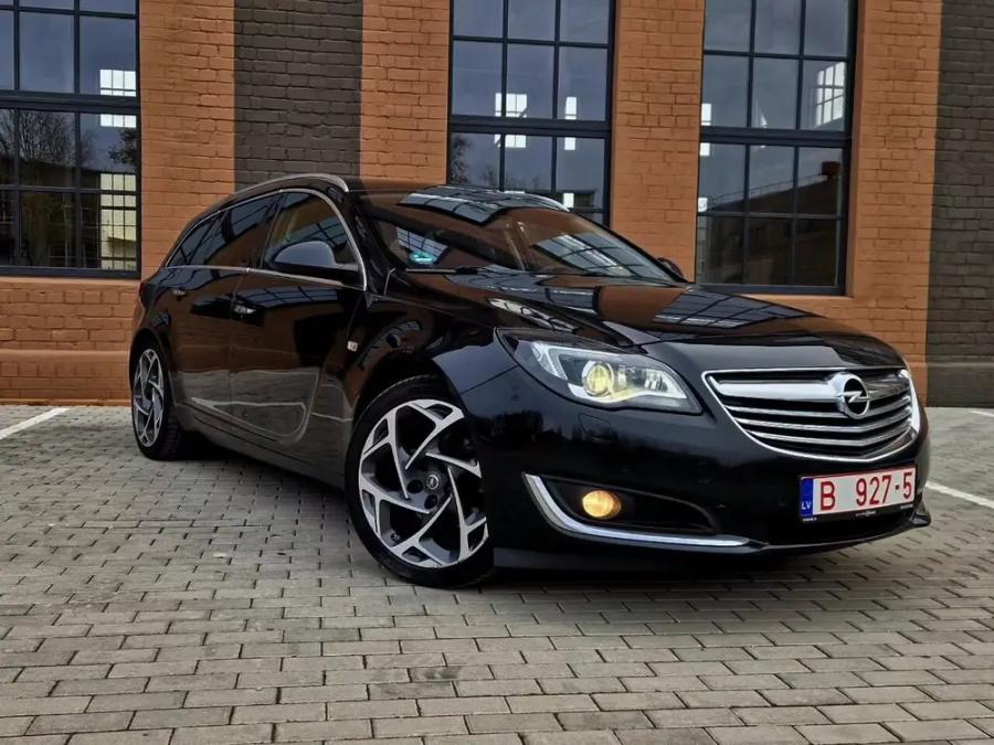Black Opel Insignia 2013 in Riga, with an engine capacity of 2.00 L and mileage of 203 thousand km for 6390 €, photo 15 on AUTOMOTO.COM.LV