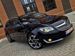 Black Opel Insignia 2013 in Riga, with an engine capacity of 2.00 L and mileage of 203 thousand km for 6390 €, photo 16 on AUTOMOTO.COM.LV