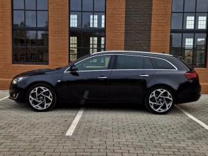 Black Opel Insignia 2013 in Riga, with an engine capacity of 2.00 L and mileage of 203 thousand km for 6390 €, photo 17 on AUTOMOTO.COM.LV