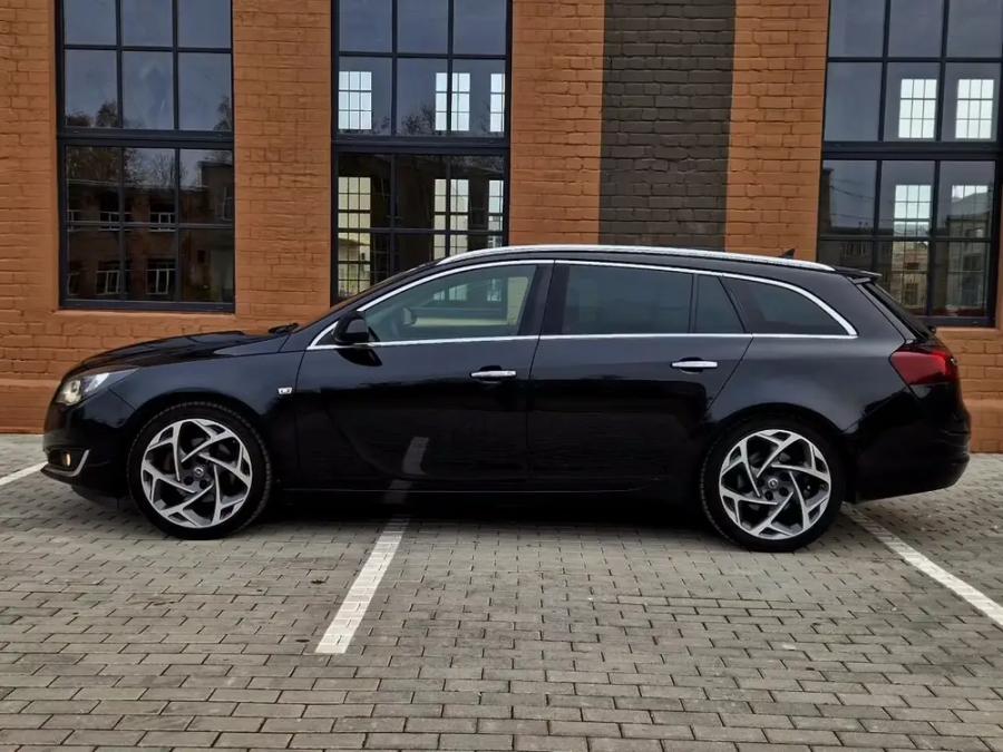 Black Opel Insignia 2013 in Riga, with an engine capacity of 2.00 L and mileage of 203 thousand km for 6390 €, photo 17 on AUTOMOTO.COM.LV