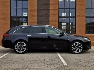 Black Opel Insignia 2013 in Riga, with an engine capacity of 2.00 L and mileage of 203 thousand km for 6390 €, photo 18 on AUTOMOTO.COM.LV