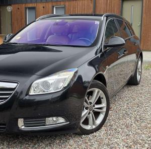 Black Opel Insignia 2013 in Raseiniai, with an engine capacity of 1.96 L and mileage of 297 thousand km for 3299 €, photo 5 on AUTOMOTO.COM.LV