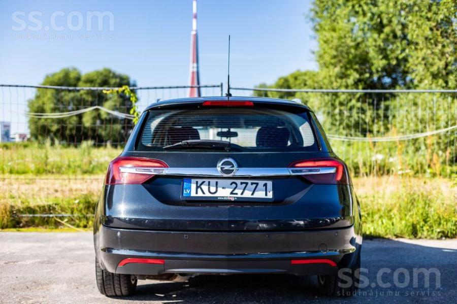 Black Opel Insignia 2013 in Riga, with an engine capacity of 2.00 L and mileage of 282 thousand km for 5990 €, photo 9 on AUTOMOTO.COM.LV