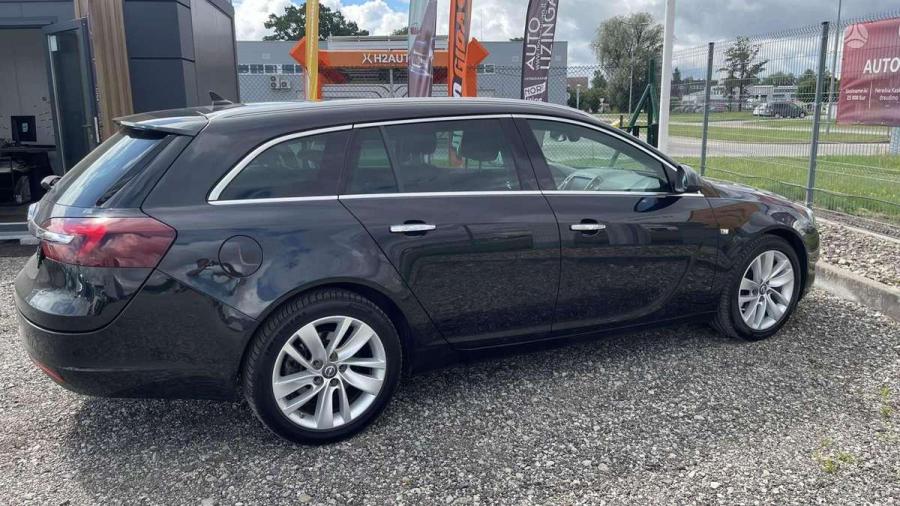 Black Opel Insignia 2013 in Marijampole, with an engine capacity of 1.96 L and mileage of 255 thousand km for 5290 €, photo 13 on AUTOMOTO.COM.LV