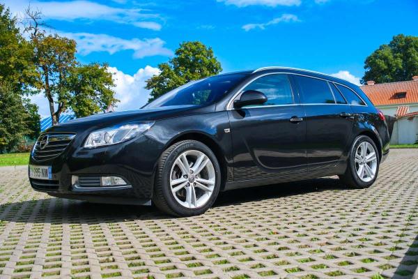 Black Opel Insignia 2013 in Kaunas, with an engine capacity of 2.00 L and mileage of 253 thousand km for 4500 €, photo 9 on AUTOMOTO.COM.LV