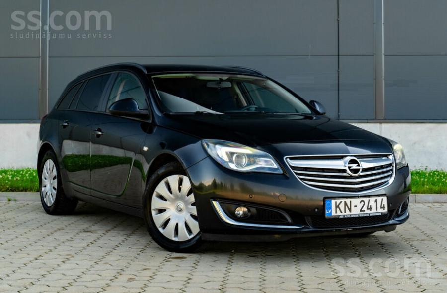 Black Opel Insignia 2014 in Riga, with an engine capacity of 2.00 L and mileage of 294 thousand km for 5990 €, photo 3 on AUTOMOTO.COM.LV