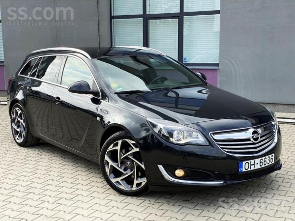 Black Opel Insignia 2014 in Riga, with an engine capacity of 2.00 L and mileage of 238 thousand km for 6600 €, photo 2 on AUTOMOTO.COM.LV