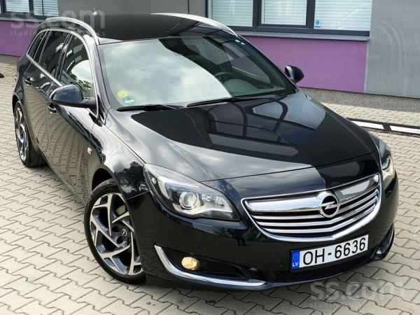 Black Opel Insignia 2014 in Riga, with an engine capacity of 2.00 L and mileage of 238 thousand km for 6600 €, photo 4 on AUTOMOTO.COM.LV