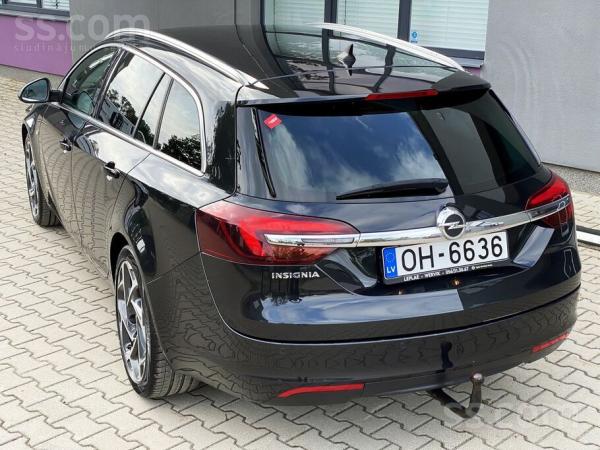 Black Opel Insignia 2014 in Riga, with an engine capacity of 2.00 L and mileage of 238 thousand km for 6600 €, photo 8 on AUTOMOTO.COM.LV