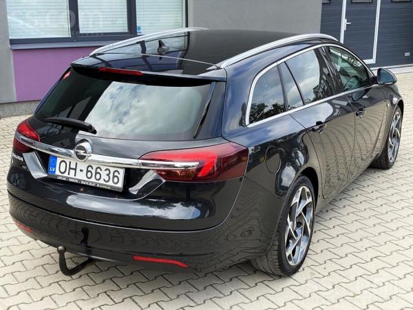 Black Opel Insignia 2014 in Riga, with an engine capacity of 2.00 L and mileage of 238 thousand km for 6600 €, photo 9 on AUTOMOTO.COM.LV