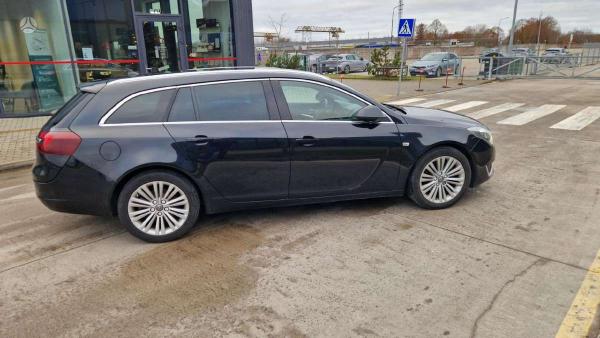 Black Opel Insignia 2014 in Siauliai, with an engine capacity of 2.00 L and mileage of 250 thousand km for 5900 €, photo 7 on AUTOMOTO.COM.LV
