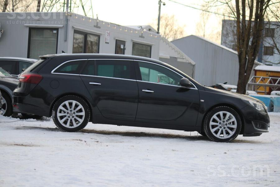 Black Opel Insignia 2014 in Riga, with an engine capacity of 2.00 L and mileage of 0 thousand km for 5790 €, photo 6 on AUTOMOTO.COM.LV