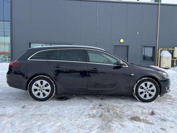 Black Opel Insignia 2014 in Siauliai, with an engine capacity of 1.96 L and mileage of 256 thousand km for 5650 €, photo 4 on AUTOMOTO.COM.LV