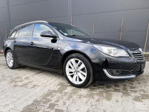 Black Opel Insignia 2014 in Vilnius, with an engine capacity of 2.00 L and mileage of 230 thousand km for 5300 €, photo 9 on AUTOMOTO.COM.LV
