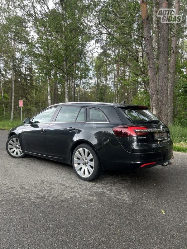 Black Opel Insignia 2014 in Klaipeda, with an engine capacity of 2.00 L and mileage of 300 thousand km for 5550 €, photo 4 on AUTOMOTO.COM.LV