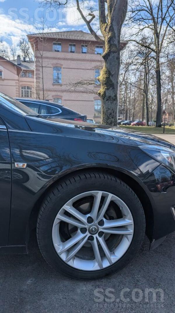Black Opel Insignia 2014 in Riga, with an engine capacity of 2.00 L and mileage of 248 thousand km for 4800 €, photo 9 on AUTOMOTO.COM.LV