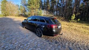 Black Opel Insignia 2014 in Jekabpils, with an engine capacity of 2.00 L and mileage of 233 thousand km for 4350 €, photo 4 on AUTOMOTO.COM.LV