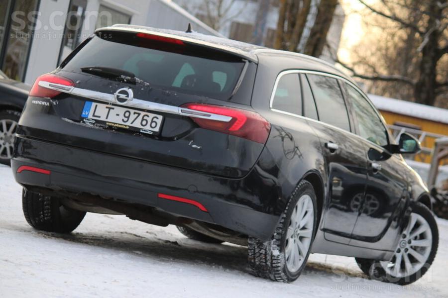 Black Opel Insignia 2014 in Riga, with an engine capacity of 2.00 L and mileage of 0 thousand km for 5490 €, photo 3 on AUTOMOTO.COM.LV