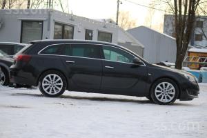 Black Opel Insignia 2014 in Riga, with an engine capacity of 2.00 L and mileage of 0 thousand km for 5490 €, photo 7 on AUTOMOTO.COM.LV