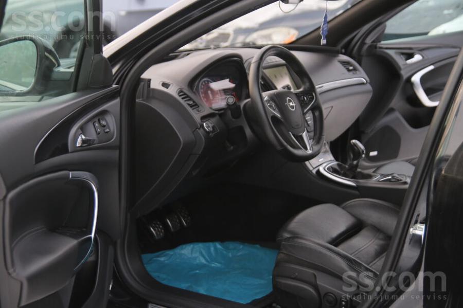 Black Opel Insignia 2014 in Riga, with an engine capacity of 2.00 L and mileage of 0 thousand km for 5490 €, photo 8 on AUTOMOTO.COM.LV