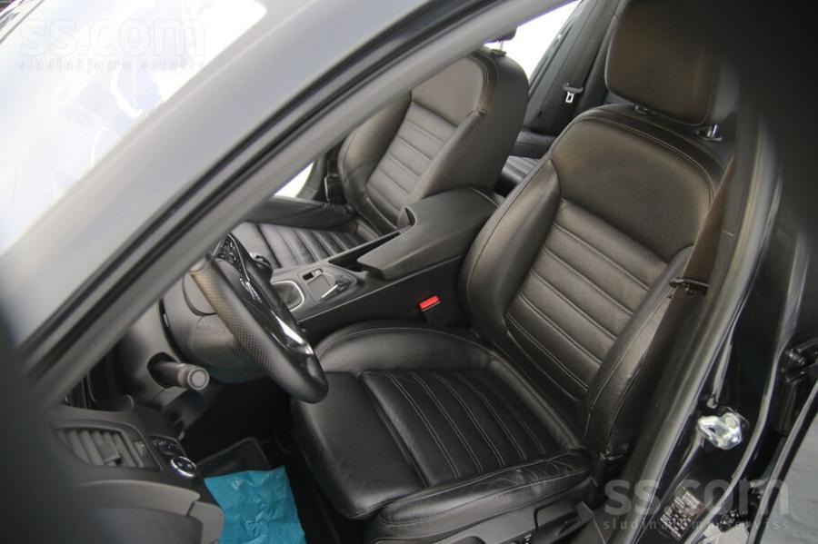 Black Opel Insignia 2014 in Riga, with an engine capacity of 2.00 L and mileage of 0 thousand km for 5490 €, photo 11 on AUTOMOTO.COM.LV