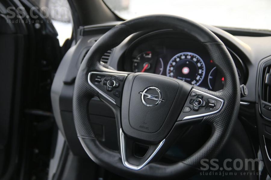 Black Opel Insignia 2014 in Riga, with an engine capacity of 2.00 L and mileage of 0 thousand km for 5490 €, photo 14 on AUTOMOTO.COM.LV