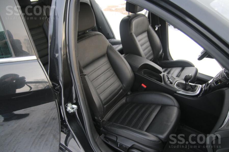 Black Opel Insignia 2014 in Riga, with an engine capacity of 2.00 L and mileage of 0 thousand km for 5490 €, photo 17 on AUTOMOTO.COM.LV