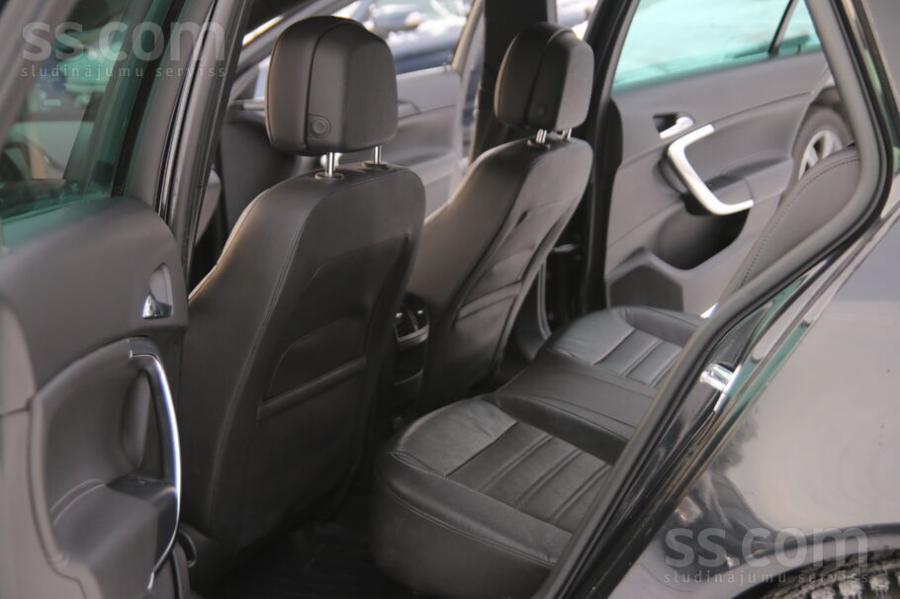 Black Opel Insignia 2014 in Riga, with an engine capacity of 2.00 L and mileage of 0 thousand km for 5490 €, photo 19 on AUTOMOTO.COM.LV