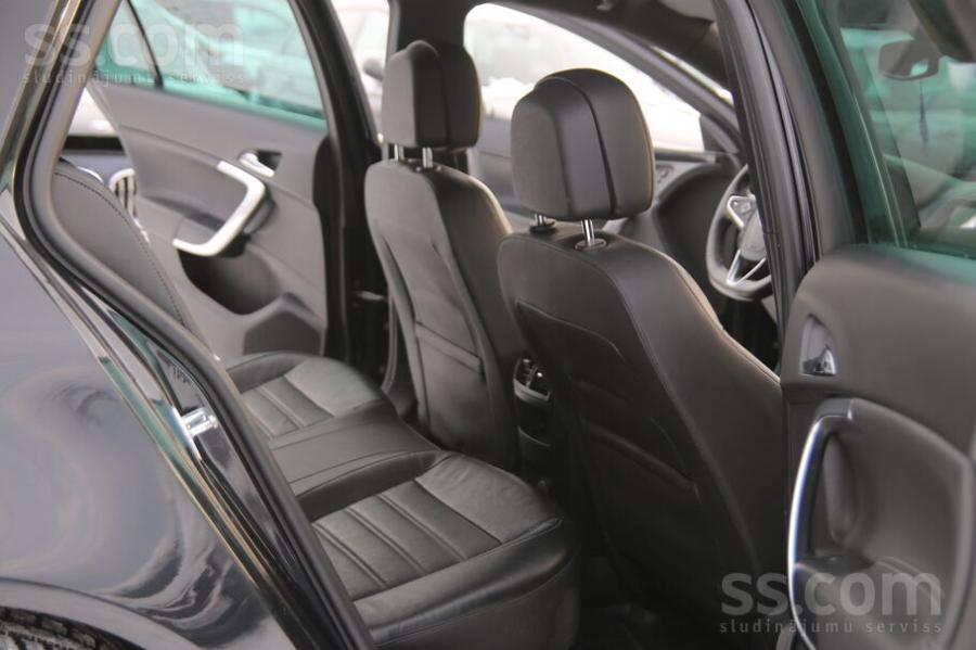 Black Opel Insignia 2014 in Riga, with an engine capacity of 2.00 L and mileage of 0 thousand km for 5490 €, photo 20 on AUTOMOTO.COM.LV