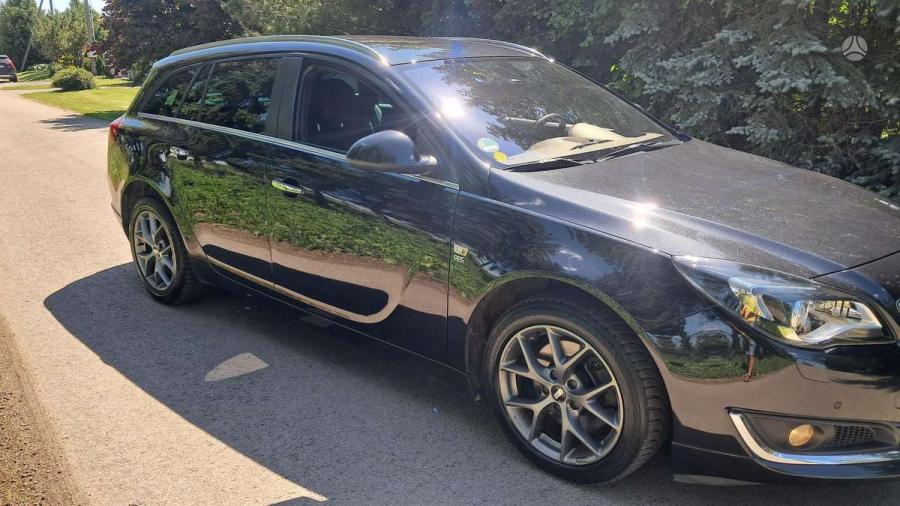 Black Opel Insignia 2014 in Marijampole, with an engine capacity of 1.96 L and mileage of 170 thousand km for 6200 €, photo 8 on AUTOMOTO.COM.LV