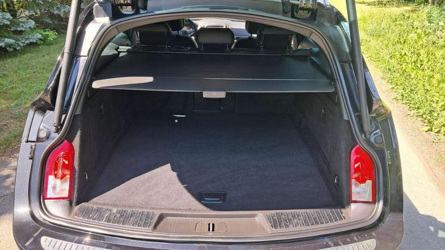 Black Opel Insignia 2014 in Marijampole, with an engine capacity of 1.96 L and mileage of 170 thousand km for 6200 €, photo 16 on AUTOMOTO.COM.LV