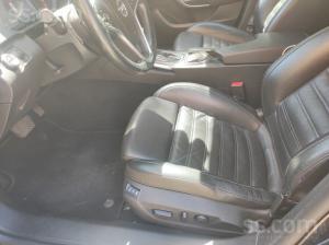 Black Opel Insignia 2014 in Riga, with an engine capacity of 2.00 L and mileage of 393 thousand km for 4300 €, photo 5 on AUTOMOTO.COM.LV