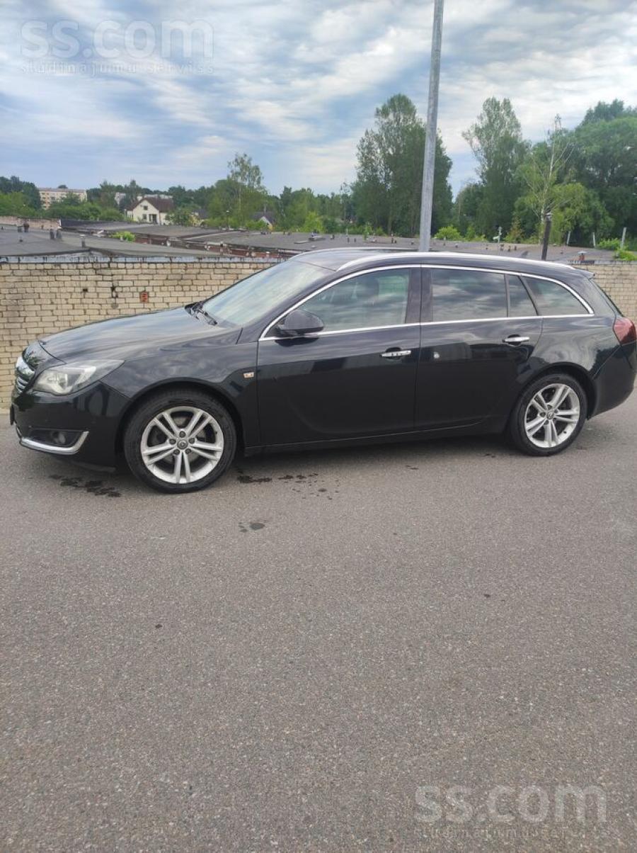 Black Opel Insignia 2014 in Riga, with an engine capacity of 2.00 L and mileage of 393 thousand km for 4300 €, photo 8 on AUTOMOTO.COM.LV