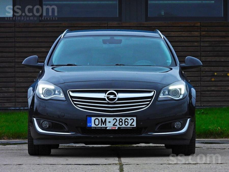 Black Opel Insignia 2014 in Riga, with an engine capacity of 2.00 L and mileage of 249 thousand km for 6290 €, photo 3 on AUTOMOTO.COM.LV