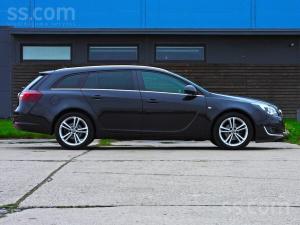 Black Opel Insignia 2014 in Riga, with an engine capacity of 2.00 L and mileage of 249 thousand km for 6290 €, photo 9 on AUTOMOTO.COM.LV