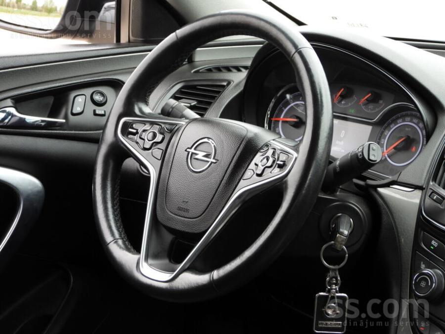 Black Opel Insignia 2014 in Riga, with an engine capacity of 2.00 L and mileage of 249 thousand km for 6290 €, photo 13 on AUTOMOTO.COM.LV