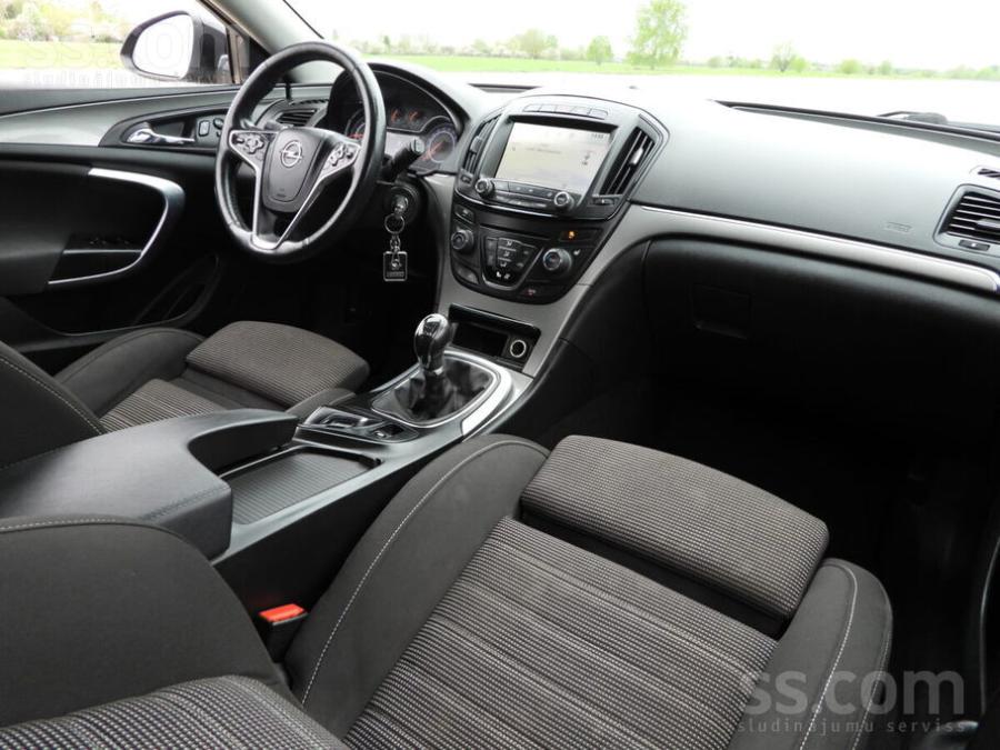 Black Opel Insignia 2014 in Riga, with an engine capacity of 2.00 L and mileage of 249 thousand km for 6290 €, photo 14 on AUTOMOTO.COM.LV