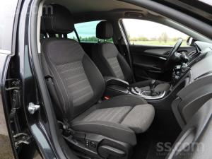 Black Opel Insignia 2014 in Riga, with an engine capacity of 2.00 L and mileage of 249 thousand km for 6290 €, photo 15 on AUTOMOTO.COM.LV