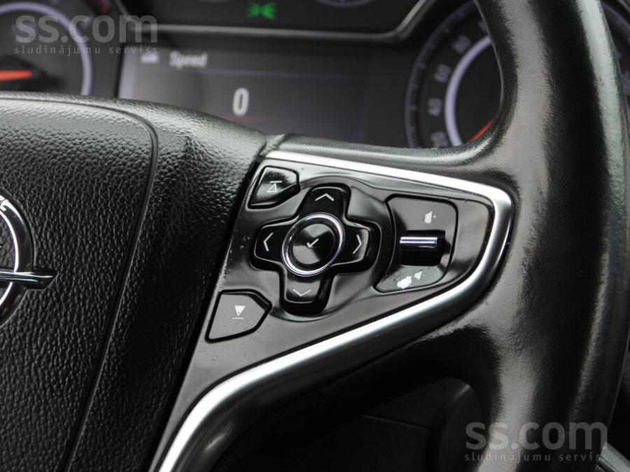 Black Opel Insignia 2014 in Riga, with an engine capacity of 2.00 L and mileage of 249 thousand km for 6290 €, photo 24 on AUTOMOTO.COM.LV