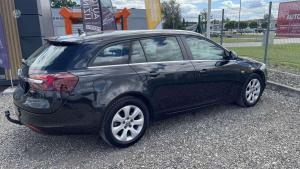 Black Opel Insignia 2014 in Marijampole, with an engine capacity of 1.96 L and mileage of 241 thousand km for 5650 €, photo 11 on AUTOMOTO.COM.LV